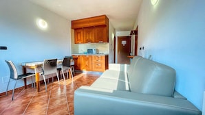 Apartamento, 1 quarto | Sala de estar