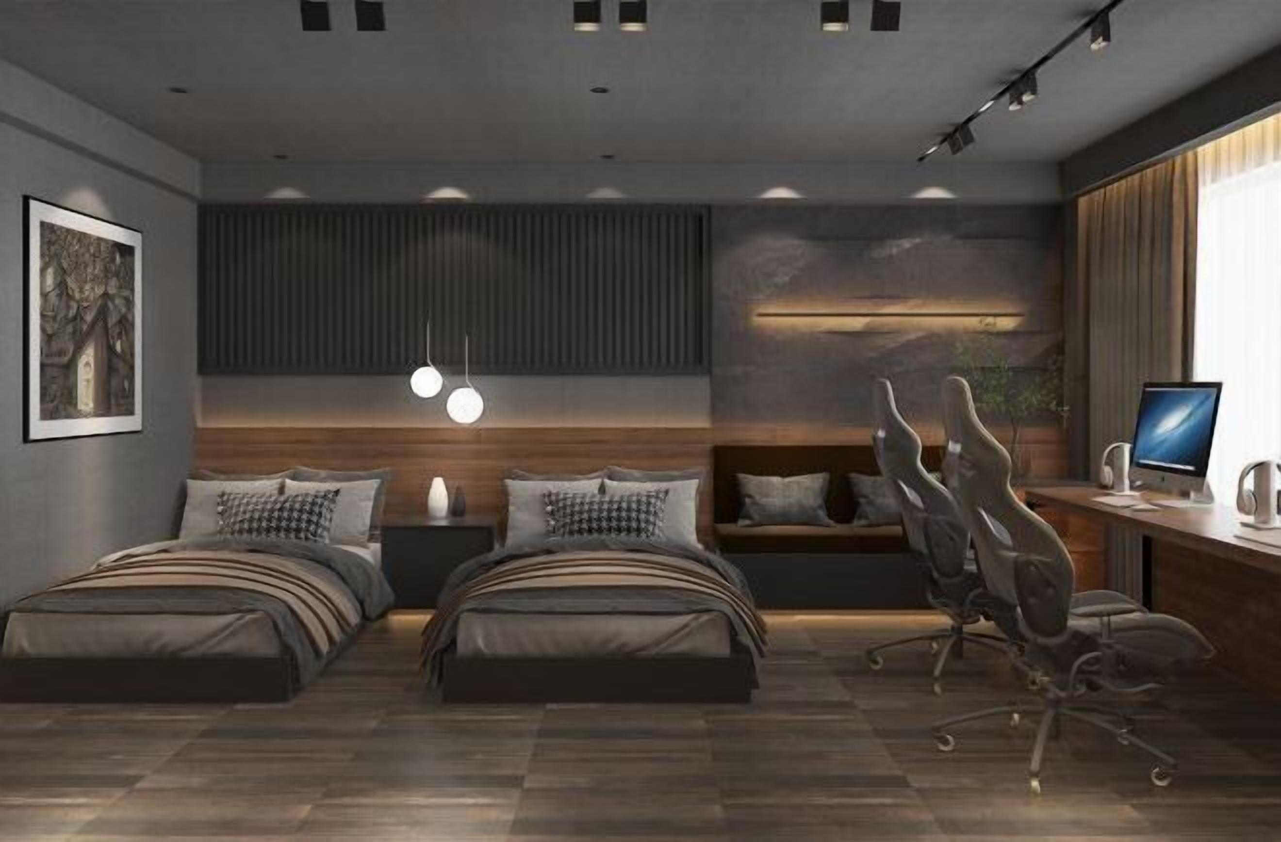 Quarto moderno com duas camas, uma escrivaninha e um computador.