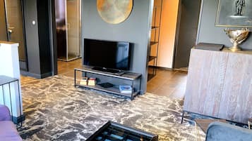 Apartamento Design em Condomínio Fechado | Sala de estar | Smart TV de 55 polegadas com canais via satélite, televisor