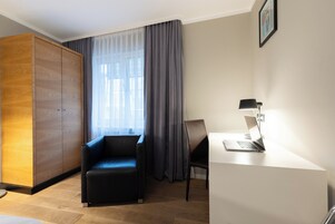 Quartos à prova de som, Wi-Fi de cortesia, roupa de cama