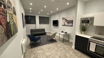 Apartamento luxo, acessível, banheiro privativo (Manhattan style apartment) | Área de estar