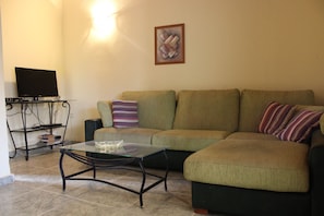 Apartamento | Sala | Televisor de 30 polegadas com canais por cabo 