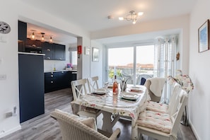 Casa conforto, suíte, vista para o mar | Cozinha compartilhada | Cadeirão de bebê