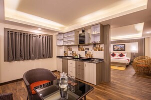 Apartment | Área de estar | TV de tela plana