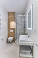 Apartamento Standard | Casa de banho | Um secador de cabelo 