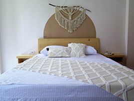 Suite-Estúdio | Minibar, Wi-fi grátis, roupa de cama fornecida