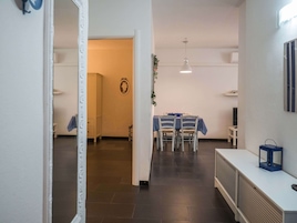 Apartamento, 1 quarto, cozinha | Área de estar | TV de tela plana