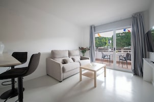 Apartamento luxo | Área de estar | TV de tela plana, impressoras