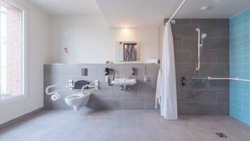 Quarto Standard, 1 cama individual, acessível | Casa de banho | Um polibã, um secador de cabelo, toalhas fornecidas, sabão