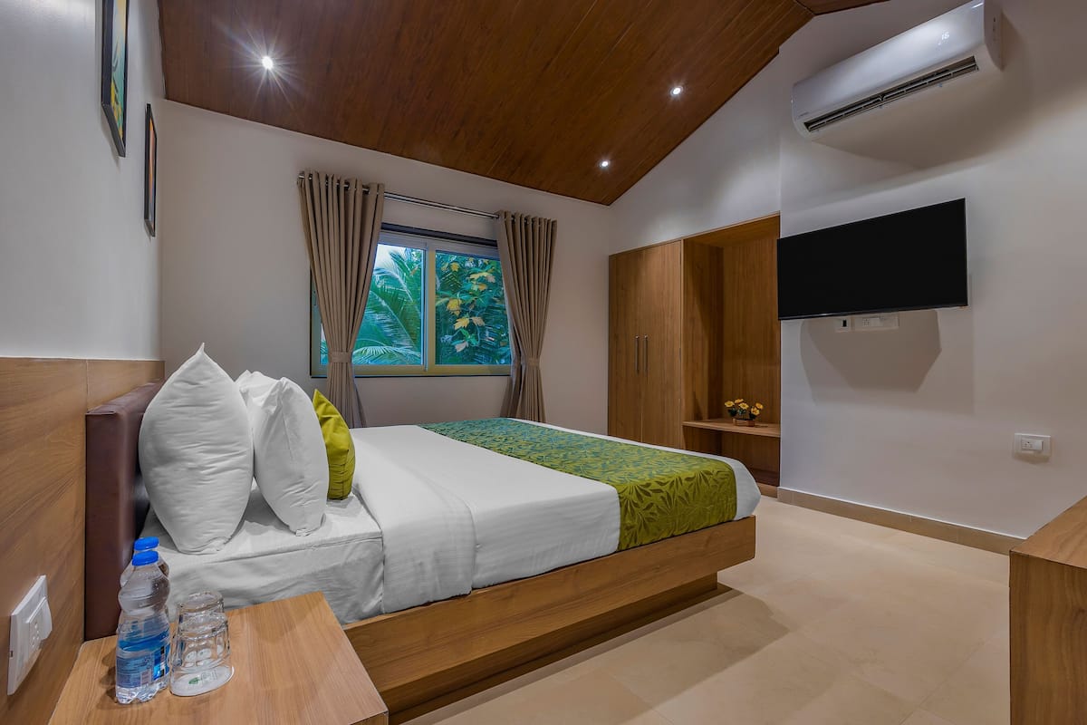 Quarto premium | 1 quarto, roupas de cama premium, cofres nos quartos, escrivaninha