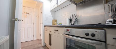 Apartamento, banheiro privativo | Cozinha compartilhada