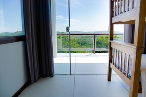 Quarto Deluxe, vista para o mar | Camas de colchão pillowtop, minibar, Wi-fi grátis