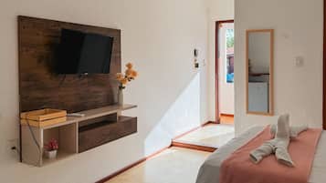 Quarto família, várias camas | 1 quarto, Wi-Fi de cortesia, roupa de cama