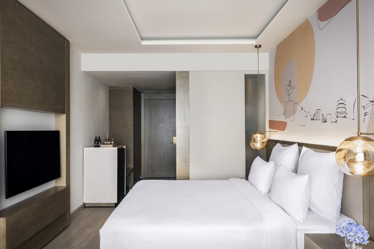 Quarto executivo, 1 cama King | Frigobar, cofres nos quartos, escrivaninha, quartos à prova de som