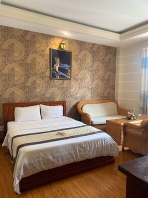 Quarto (VIP) | Frigobar, escrivaninha, ferros/tábuas de passar roupa, Wi-Fi de cortesia