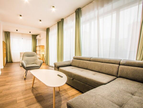 Penthouse Exclusiva | Sala de estar | Televisor LED de 128 cm com canais digitais, televisor 