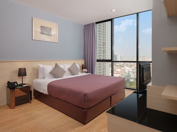 Suíte superior, 2 quartos | 1 quarto, cofres nos quartos, ferros/tábuas de passar roupa