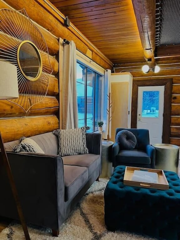 This Beautiful Log Cottage Has Large Windows That Let In Lots Of Light - Alaska