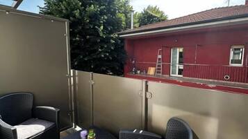 Quarto casal clássico | Terraço/pátio