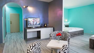 Quarto quádruplo | Frigobar, individualmente decorados, escrivaninha, Wi-Fi de cortesia