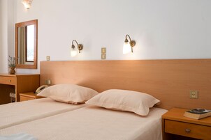 Quarto Económico | Roupa de cama fornecida 