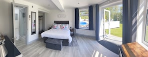 Apartamento, 1 cama Queen | 1 quarto, ferros/tábuas de passar roupa, Wi-Fi de cortesia