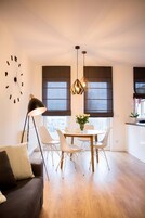 Apartamento empresarial | Área de estar | TV LCD