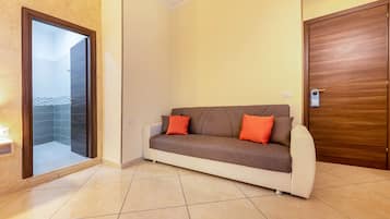 Quarto Deluxe | Minibar, cofre no quarto, secretária