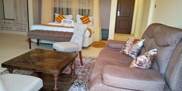 Quarto Deluxe | Roupa de cama fornecida 