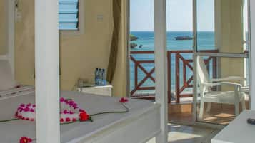 Quarto, sacada, vista para o oceano