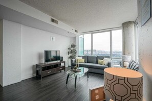 Apartamento, 2 quartos | Sala de estar | TV de ecrã plano, Netflix 