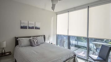 Apartamento, 2 quartos | 2 quartos, secretária adequada para computadores portáteis