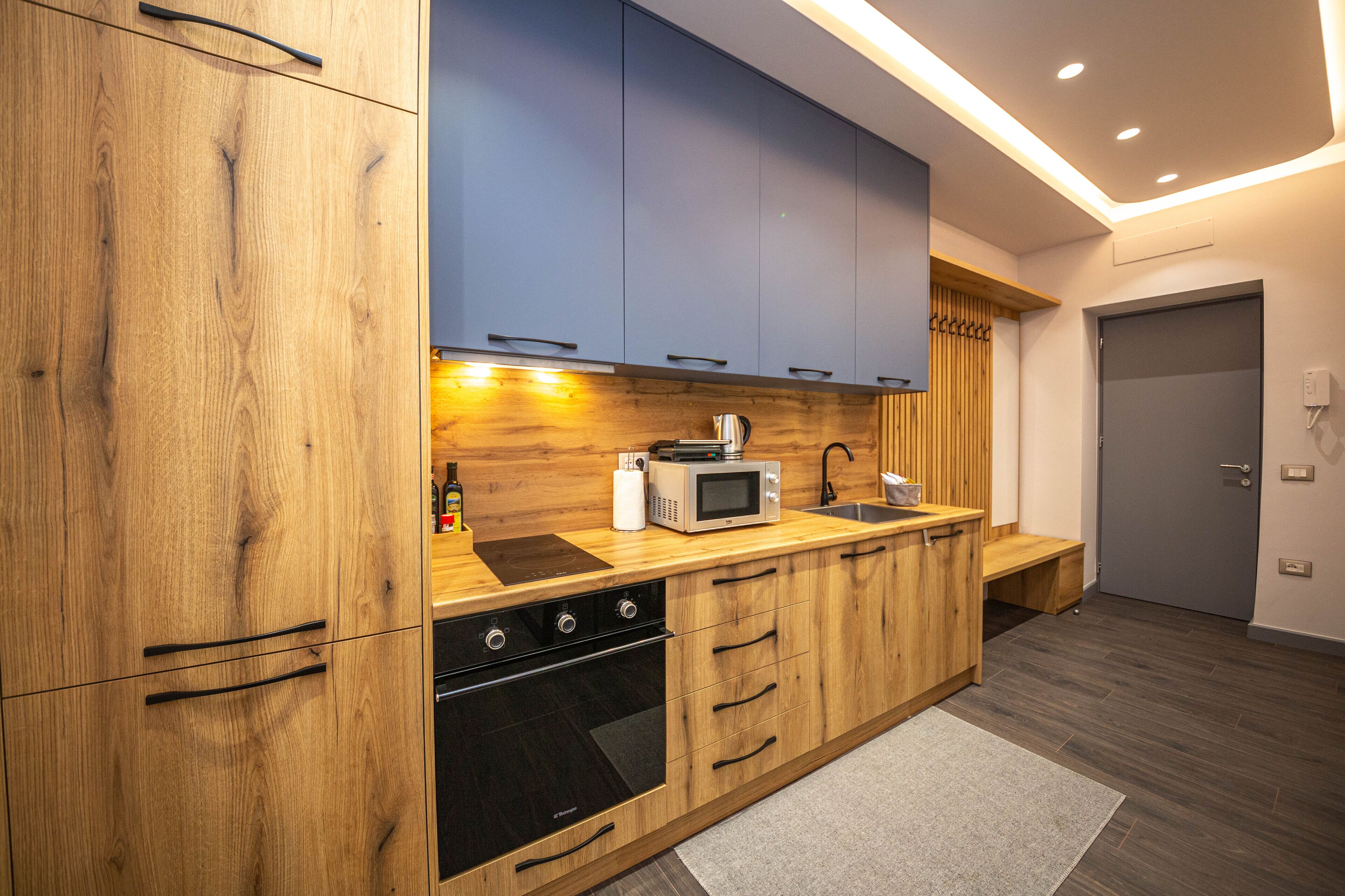 Apartamento, 1 quarto, sacada | Cozinha privada | Geladeira grande, micro-ondas, fogão, cooktop