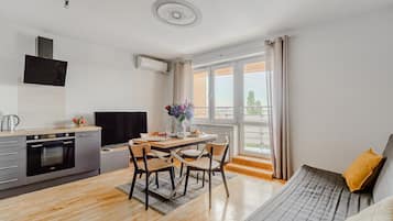 Apartamento luxo | Sala de estar | TV LCD 42 polegadas com canais a cabo, TV