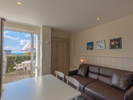 Apartamento | Área de estar | TV de tela plana