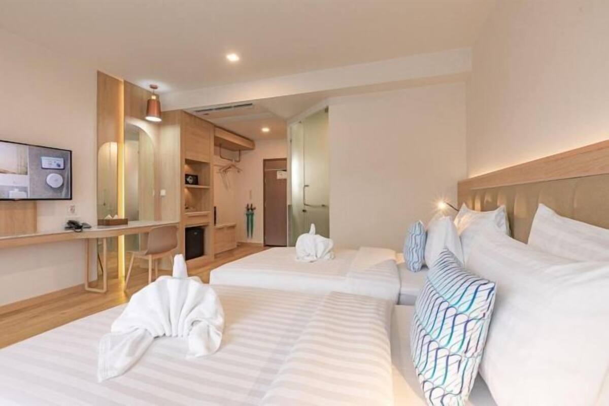 Roupa de alta qualidade, camas de colchão pillowtop, minibar 