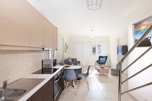 Apartamento Panorâmico | Cozinha privada | Um frigorífico/congelador grande, um micro-ondas, um forno 