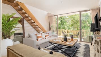 Apartamento Premium | Sala de estar | Smart TV de 40 de polegadas com canais via satélite, televisor, Netflix