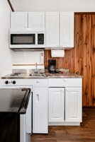 Uma cafeteira/bule, Rolo de cozinha