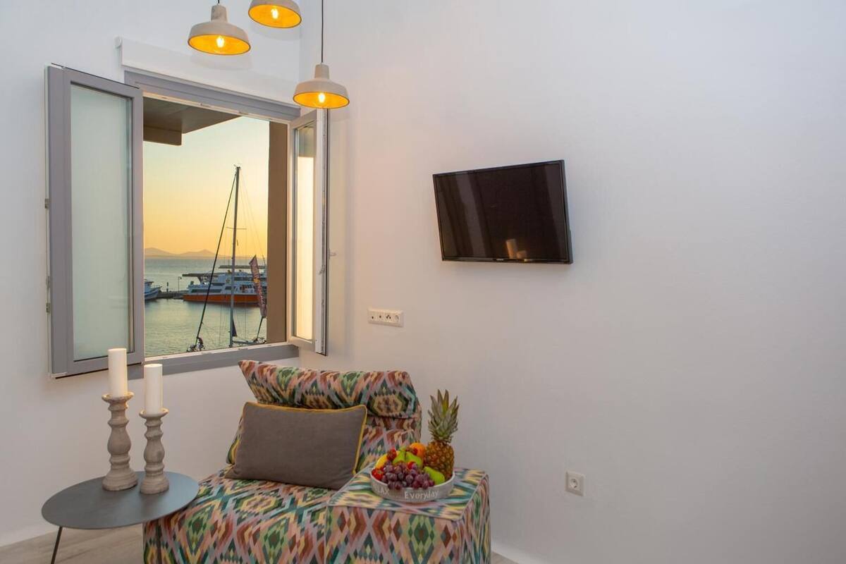 Apartamento superior | Área de estar | TV de tela plana