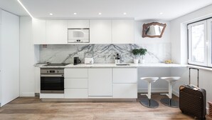 Apartamento Comfort, 1 cama queen-size, não fumadores, vista para o pátio | Cozinha privada | Uma máquina de café expresso 