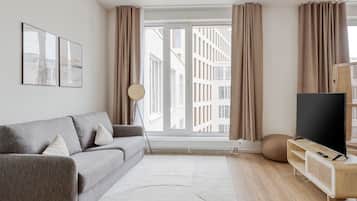 Suite XL with sofa bed | Sala de estar | Smart TV