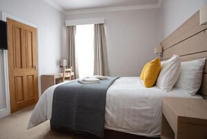 Quarto Deluxe | Minibar, quartos insonorizados, Wi-fi grátis, roupa de cama fornecida 