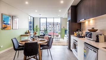 Apartamento clássico, 1 quarto | Sala de jantar