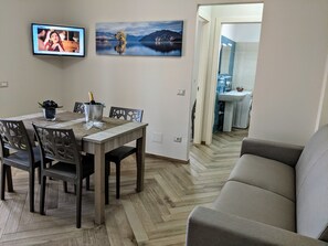 Apartamento Deluxe | Sala de estar
