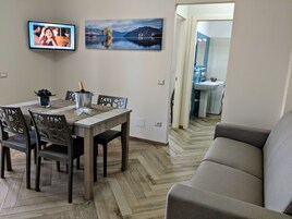 Apartamento Deluxe | Sala de estar