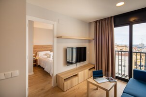 Apartamento Club | Sala de estar | TV de ecrã plano 