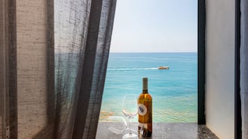CAMERA DELUXE CON VISTA MARE | 1 quarto, edredons de pluma