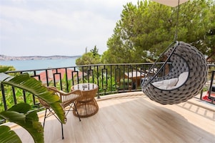Quarto luxo, vista para o mar | Terraço/pátio