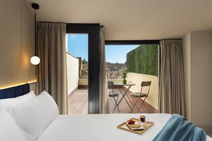 Duplex urbano, 1 quarto, terraço, vista para a cidade | 1 quarto, espaço de trabalho para notebook, Wi-Fi de cortesia